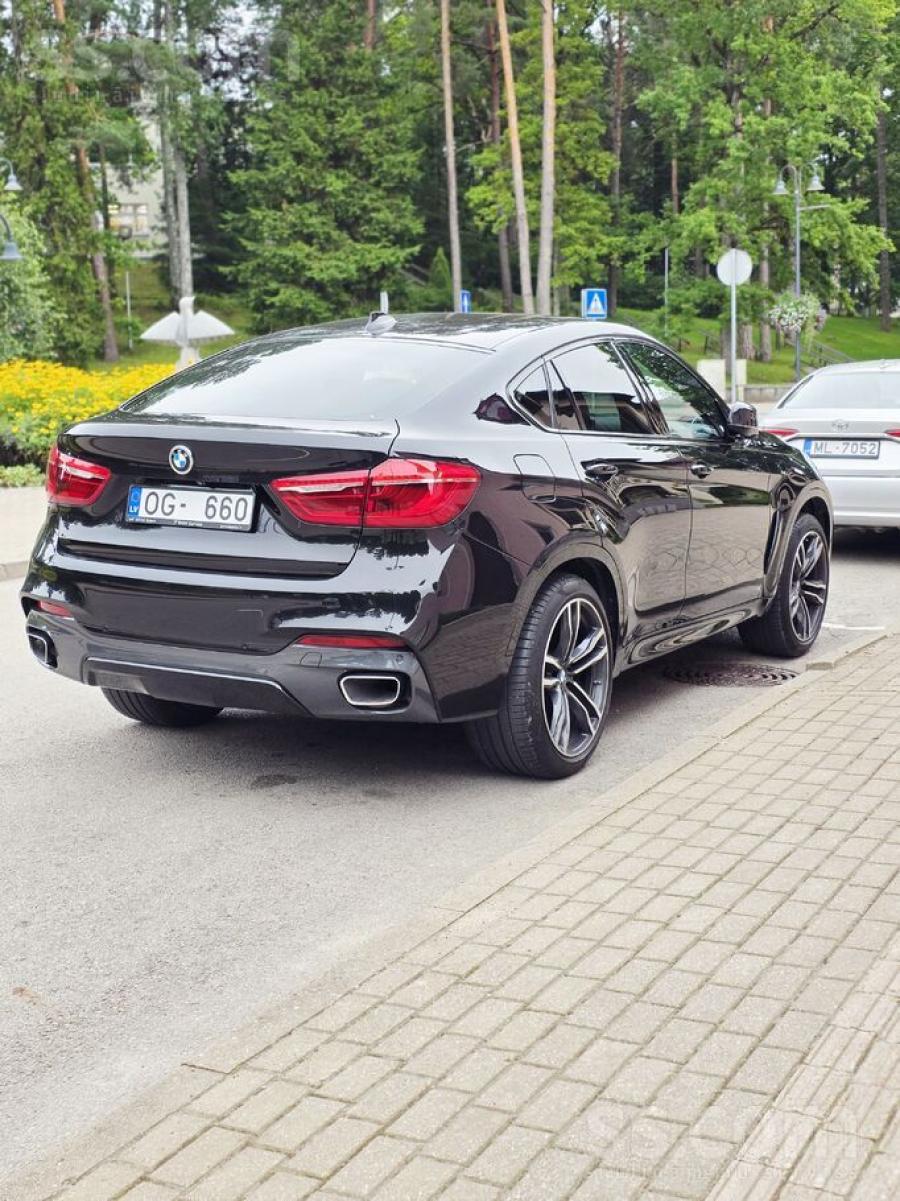 Black BMW X6 2016 in Ogre, with an engine capacity of 3.00 L and mileage of 221 thousand km for 28000 €, photo 5 on AUTOMOTO.COM.LV