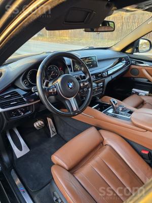 Black BMW X6 2016 in Ogre, with an engine capacity of 3.00 L and mileage of 221 thousand km for 28000 €, photo 7 on AUTOMOTO.COM.LV