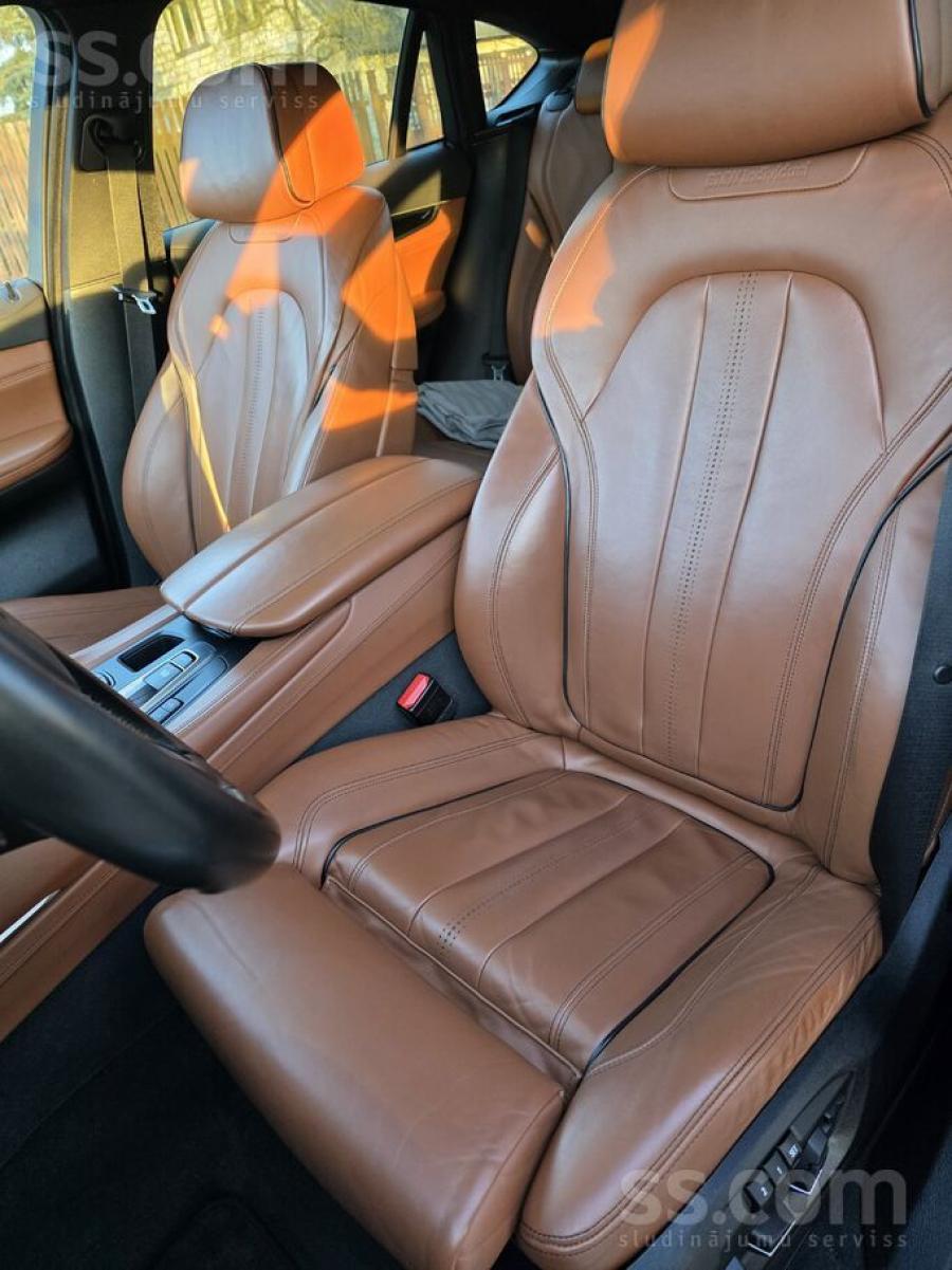 Black BMW X6 2016 in Ogre, with an engine capacity of 3.00 L and mileage of 221 thousand km for 28000 €, photo 8 on AUTOMOTO.COM.LV