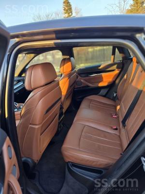Black BMW X6 2016 in Ogre, with an engine capacity of 3.00 L and mileage of 221 thousand km for 28000 €, photo 17 on AUTOMOTO.COM.LV