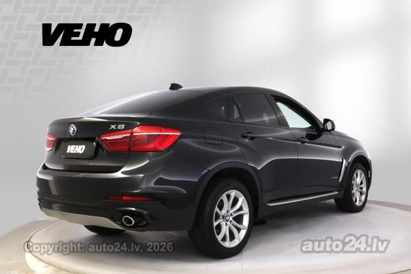 Black BMW X6 2016 in Tallinn, with an engine capacity of 3.00 L and mileage of 102 thousand km for 24900 €, photo 3 on AUTOMOTO.COM.LV