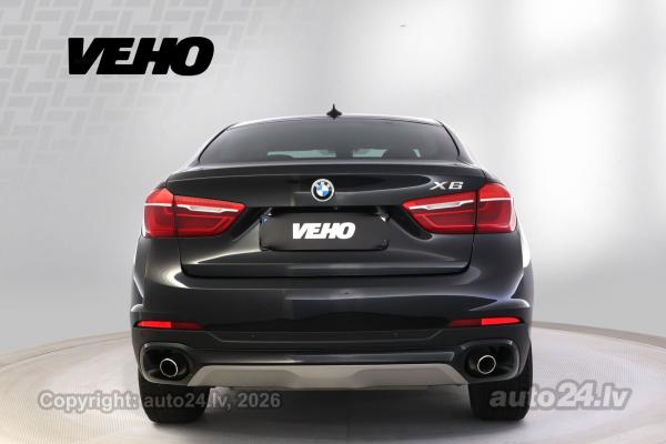 Black BMW X6 2016 in Tallinn, with an engine capacity of 3.00 L and mileage of 102 thousand km for 24900 €, photo 8 on AUTOMOTO.COM.LV