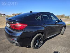 Melns BMW X6 2016 Liepāja, ar dzinēja tilpumu 3.00 L un nobraukumu 179 tūkst. km par 22500 €, foto 13 vietnē AUTOMOTO.COM.LV