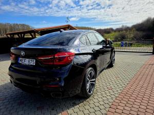 Black BMW X6 2016 in Kretinga, with an engine capacity of 2.99 L and mileage of 271 thousand km for 20600 €, photo 6 on AUTOMOTO.COM.LV
