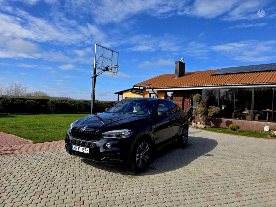 Black BMW X6 2016 in Kretinga, with an engine capacity of 2.99 L and mileage of 271 thousand km for 20600 €, photo 16 on AUTOMOTO.COM.LV
