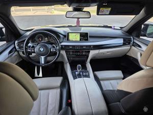 Black BMW X6 2016 in Kretinga, with an engine capacity of 2.99 L and mileage of 271 thousand km for 20600 €, photo 20 on AUTOMOTO.COM.LV