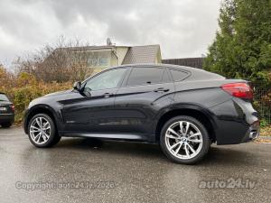 Black BMW X6 2016 in Tallinn, with an engine capacity of 3.00 L and mileage of 109 thousand km for 28000 €, photo 6 on AUTOMOTO.COM.LV