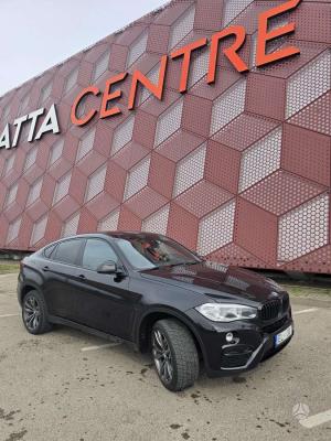 Black BMW X6 2016 in Riga, with an engine capacity of 2.99 L and mileage of 275 thousand km for 18500 €, photo 4 on AUTOMOTO.COM.LV