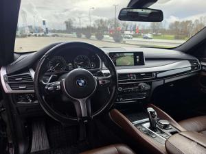 Black BMW X6 2016 in Riga, with an engine capacity of 2.99 L and mileage of 275 thousand km for 18500 €, photo 6 on AUTOMOTO.COM.LV