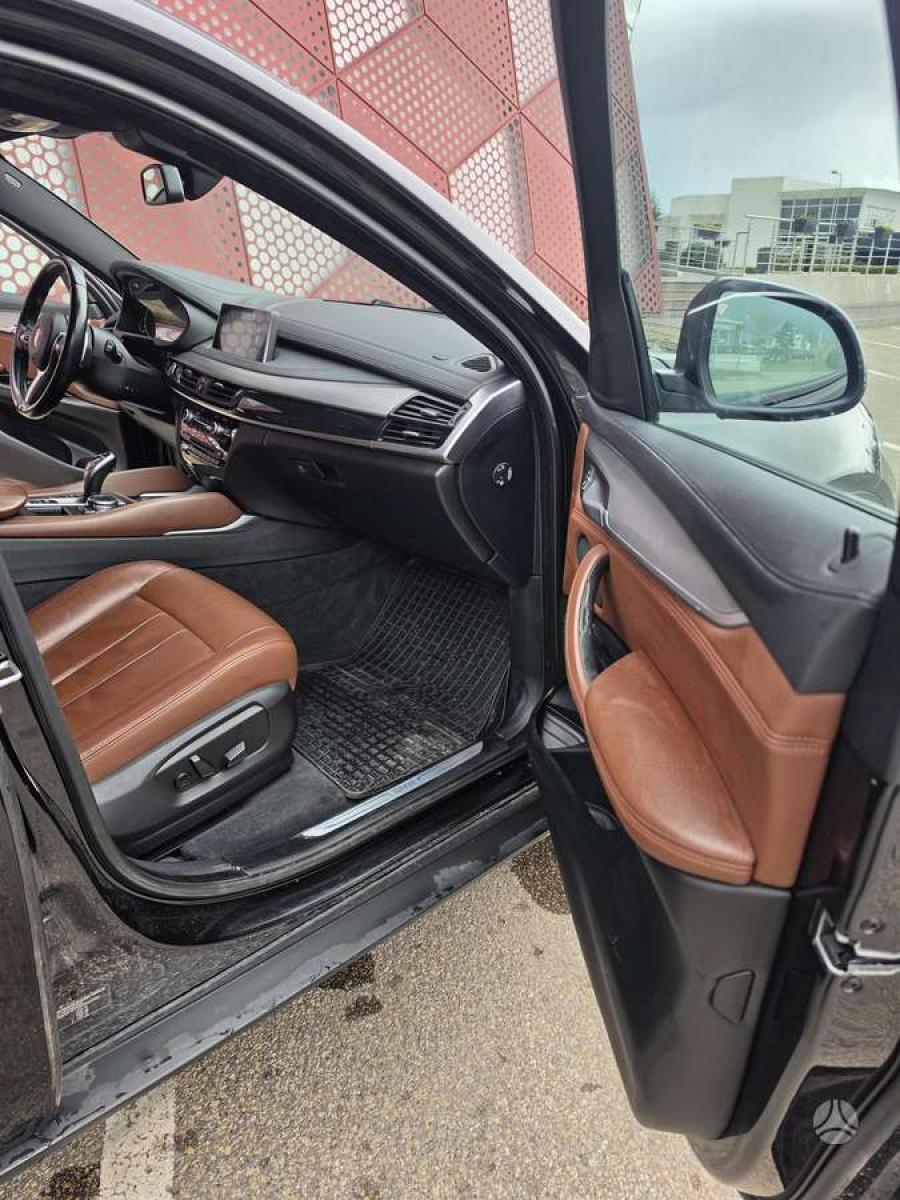 Black BMW X6 2016 in Riga, with an engine capacity of 2.99 L and mileage of 275 thousand km for 18500 €, photo 8 on AUTOMOTO.COM.LV
