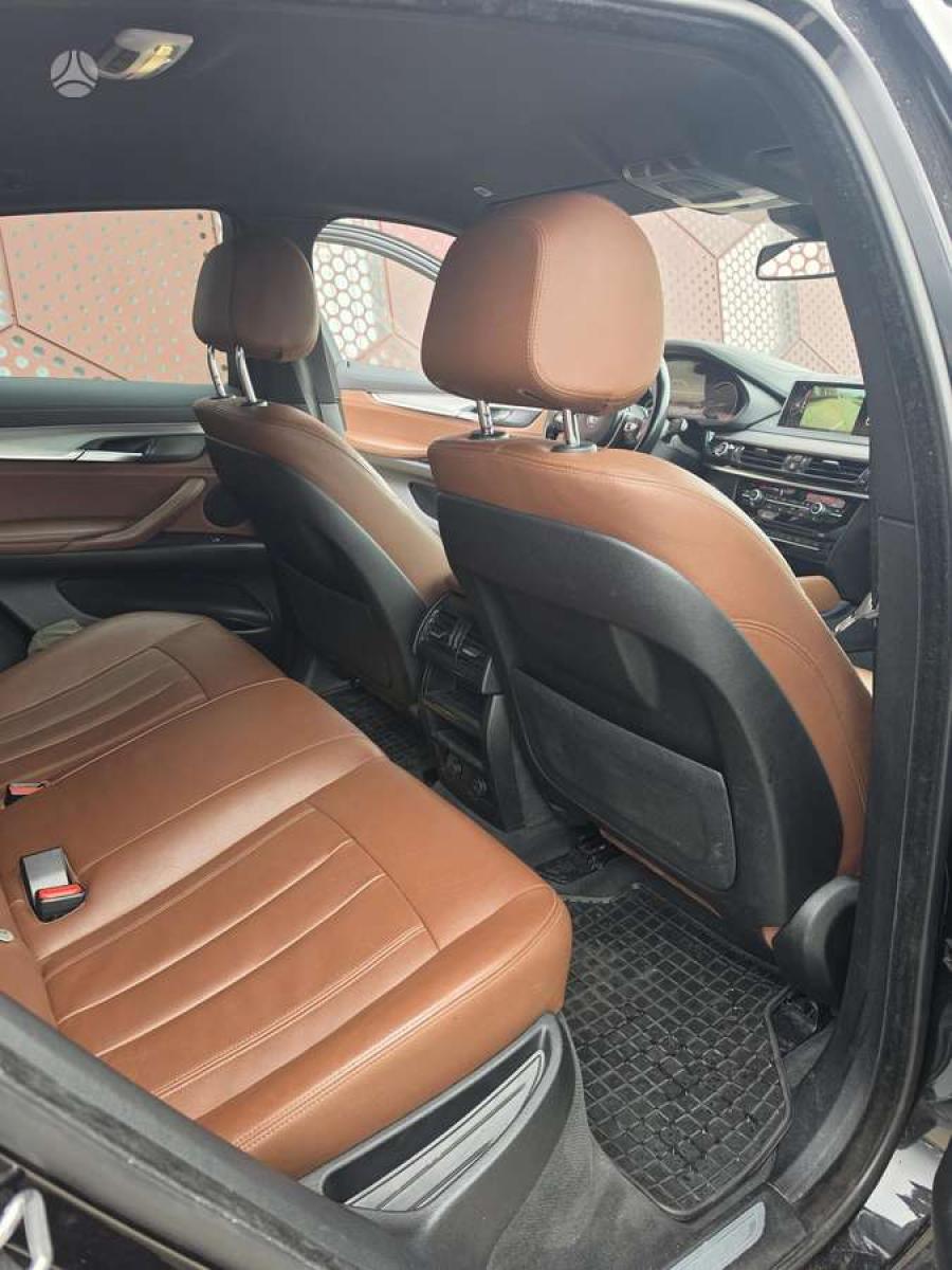 Black BMW X6 2016 in Riga, with an engine capacity of 2.99 L and mileage of 275 thousand km for 18500 €, photo 9 on AUTOMOTO.COM.LV