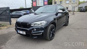 Black BMW X6 2016 in Riga, with an engine capacity of 3.00 L and mileage of 181 thousand km for 23990 €, photo  on AUTOMOTO.COM.LV