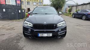 Black BMW X6 2016 in Riga, with an engine capacity of 3.00 L and mileage of 181 thousand km for 23990 €, photo 4 on AUTOMOTO.COM.LV