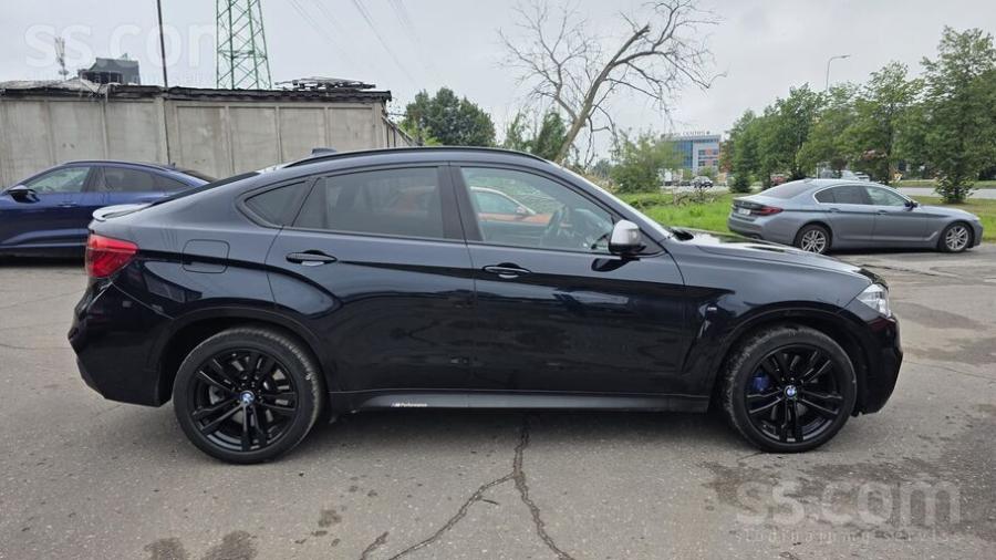 Black BMW X6 2016 in Riga, with an engine capacity of 3.00 L and mileage of 181 thousand km for 23990 €, photo 6 on AUTOMOTO.COM.LV