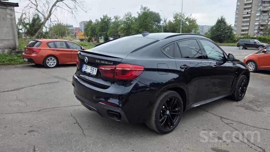Black BMW X6 2016 in Riga, with an engine capacity of 3.00 L and mileage of 181 thousand km for 23990 €, photo 7 on AUTOMOTO.COM.LV