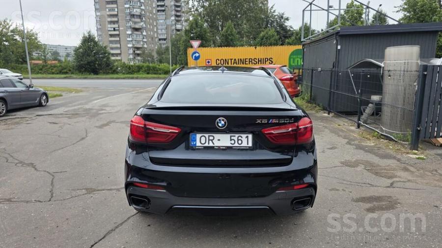 Black BMW X6 2016 in Riga, with an engine capacity of 3.00 L and mileage of 181 thousand km for 23990 €, photo 8 on AUTOMOTO.COM.LV