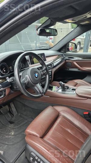 Black BMW X6 2016 in Riga, with an engine capacity of 3.00 L and mileage of 181 thousand km for 23990 €, photo 13 on AUTOMOTO.COM.LV