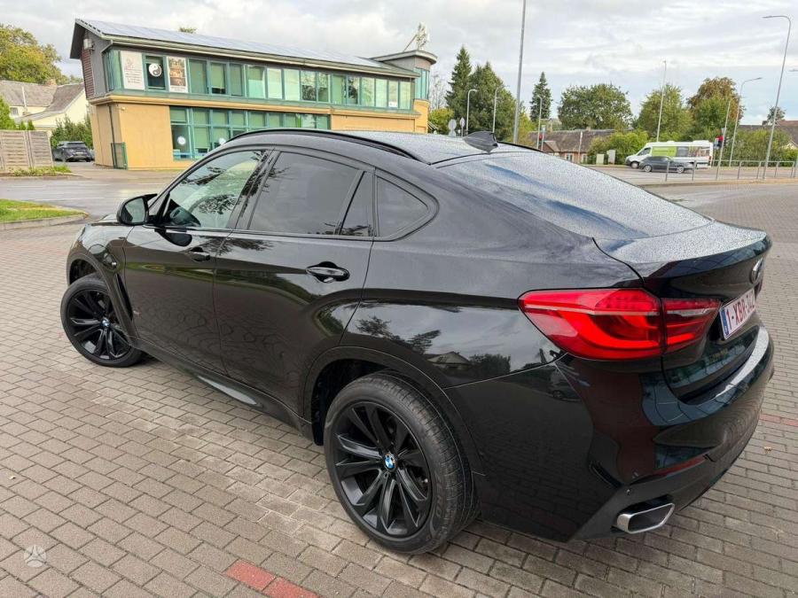 Black BMW X6 2016 in Utena, with an engine capacity of 2.99 L and mileage of 210 thousand km for 21700 €, photo 8 on AUTOMOTO.COM.LV