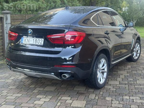 BMW X6 2016 in Riga on AUTOMOTO.COM.LV Black BMW X6 2016 in Riga, with an engine capacity of 3.00 L and mileage of 101 thousand km for 29500 €, photo 3 on AUTOMOTO.COM.LV