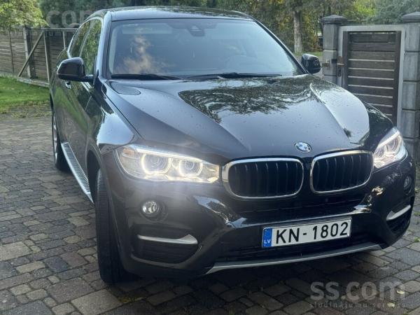 BMW X6 2016 in Riga on AUTOMOTO.COM.LV Black BMW X6 2016 in Riga, with an engine capacity of 3.00 L and mileage of 101 thousand km for 29500 €, photo 4 on AUTOMOTO.COM.LV