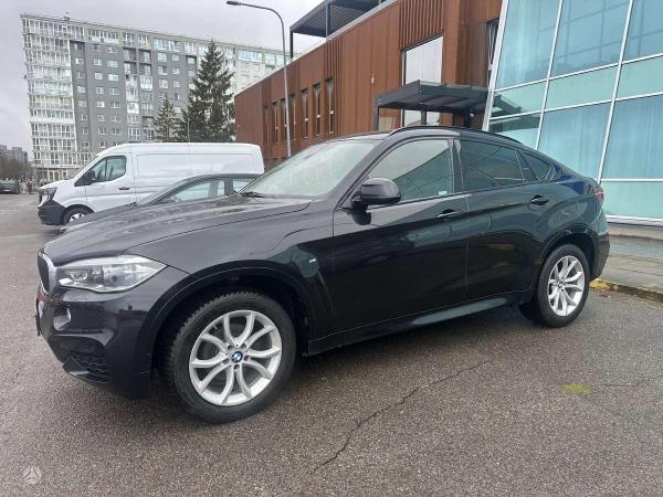 Black BMW X6 2017 in Vilnius, with an engine capacity of 2.99 L and mileage of 244 thousand km for 25490 €, photo 1 on AUTOMOTO.COM.LV