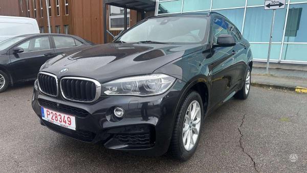Black BMW X6 2017 in Vilnius, with an engine capacity of 2.99 L and mileage of 244 thousand km for 25490 €, photo 2 on AUTOMOTO.COM.LV