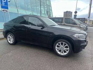 Black BMW X6 2017 in Vilnius, with an engine capacity of 2.99 L and mileage of 244 thousand km for 25490 €, photo 4 on AUTOMOTO.COM.LV