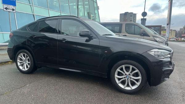 Black BMW X6 2017 in Vilnius, with an engine capacity of 2.99 L and mileage of 244 thousand km for 25490 €, photo 5 on AUTOMOTO.COM.LV
