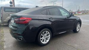 Black BMW X6 2017 in Vilnius, with an engine capacity of 2.99 L and mileage of 244 thousand km for 25490 €, photo 6 on AUTOMOTO.COM.LV