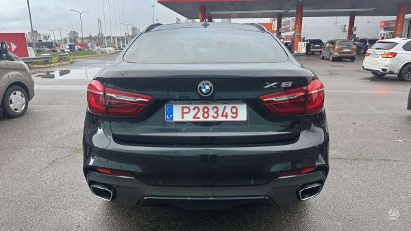 Black BMW X6 2017 in Vilnius, with an engine capacity of 2.99 L and mileage of 244 thousand km for 25490 €, photo 7 on AUTOMOTO.COM.LV