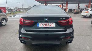 Black BMW X6 2017 in Vilnius, with an engine capacity of 2.99 L and mileage of 244 thousand km for 25490 €, photo 7 on AUTOMOTO.COM.LV