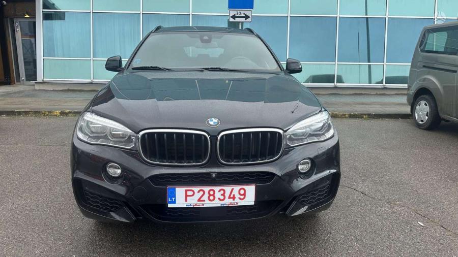 Black BMW X6 2017 in Vilnius, with an engine capacity of 2.99 L and mileage of 244 thousand km for 25490 €, photo 9 on AUTOMOTO.COM.LV