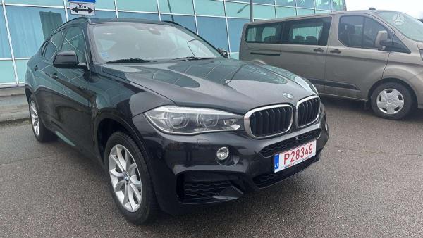 Black BMW X6 2017 in Vilnius, with an engine capacity of 2.99 L and mileage of 244 thousand km for 25490 €, photo 10 on AUTOMOTO.COM.LV