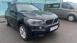 Black BMW X6 2017 in Vilnius, with an engine capacity of 2.99 L and mileage of 244 thousand km for 25490 €, photo 10 on AUTOMOTO.COM.LV