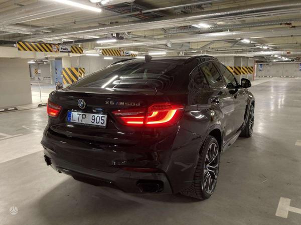 Black BMW X6 2017 in Vilnius, with an engine capacity of 3.00 L and mileage of 136 thousand km for 35490 €, photo 4 on AUTOMOTO.COM.LV