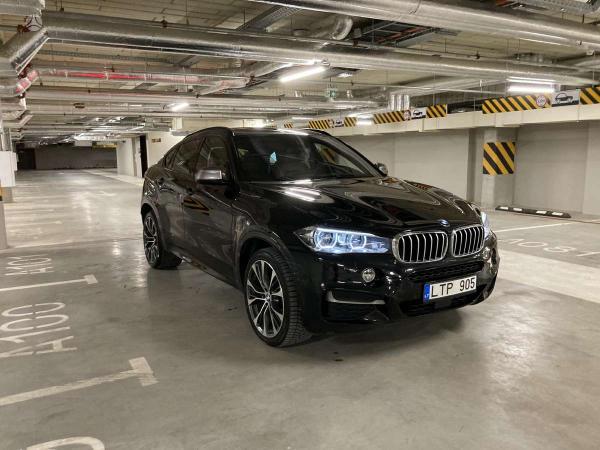 Black BMW X6 2017 in Vilnius, with an engine capacity of 3.00 L and mileage of 136 thousand km for 35490 €, photo 9 on AUTOMOTO.COM.LV