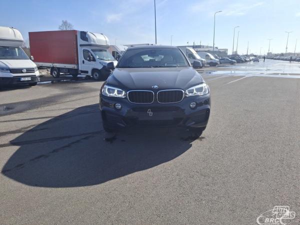 Black BMW X6 2017 in Avizieniai, with an engine capacity of 3.00 L and mileage of 99 thousand km for 24900 €, photo 1 on AUTOMOTO.COM.LV