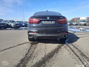 Black BMW X6 2017 in Avizieniai, with an engine capacity of 3.00 L and mileage of 99 thousand km for 24900 €, photo 5 on AUTOMOTO.COM.LV