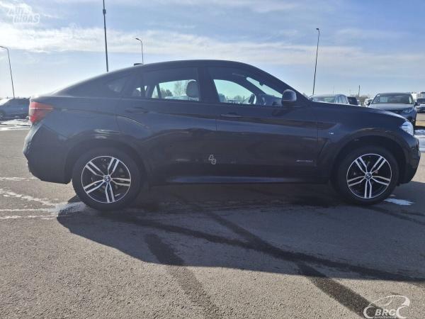 Black BMW X6 2017 in Avizieniai, with an engine capacity of 3.00 L and mileage of 99 thousand km for 24900 €, photo 6 on AUTOMOTO.COM.LV