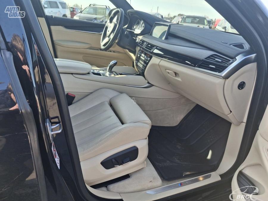 Black BMW X6 2017 in Avizieniai, with an engine capacity of 3.00 L and mileage of 99 thousand km for 24900 €, photo 14 on AUTOMOTO.COM.LV