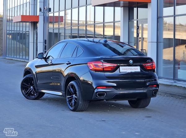 Black BMW X6 2017 in Vilnius, with an engine capacity of 3.00 L and mileage of 270 thousand km for 23950 €, photo 2 on AUTOMOTO.COM.LV