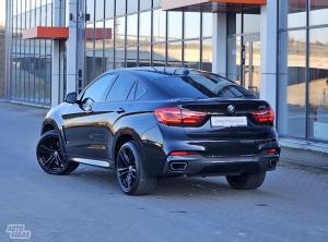 Black BMW X6 2017 in Vilnius, with an engine capacity of 3.00 L and mileage of 270 thousand km for 23950 €, photo 3 on AUTOMOTO.COM.LV