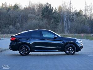 Black BMW X6 2017 in Vilnius, with an engine capacity of 3.00 L and mileage of 270 thousand km for 23950 €, photo 4 on AUTOMOTO.COM.LV