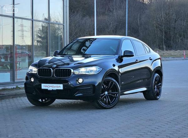 Black BMW X6 2017 in Vilnius, with an engine capacity of 3.00 L and mileage of 270 thousand km for 23950 €, photo 4 on AUTOMOTO.COM.LV