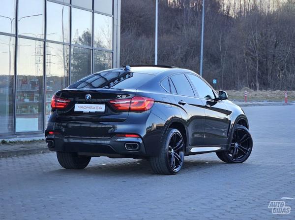 Black BMW X6 2017 in Vilnius, with an engine capacity of 3.00 L and mileage of 270 thousand km for 23950 €, photo 5 on AUTOMOTO.COM.LV