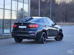 Black BMW X6 2017 in Vilnius, with an engine capacity of 3.00 L and mileage of 270 thousand km for 23950 €, photo 6 on AUTOMOTO.COM.LV