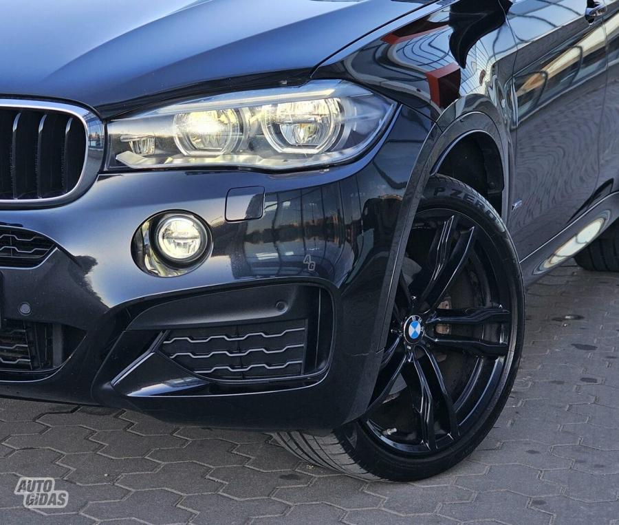 Black BMW X6 2017 in Vilnius, with an engine capacity of 3.00 L and mileage of 270 thousand km for 23950 €, photo 11 on AUTOMOTO.COM.LV