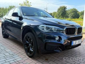 BMW X6 2017 in Riga on AUTOMOTO.COM.LV Black BMW X6 2017 in Riga, with an engine capacity of 3.00 L and mileage of 0 thousand km for 23500 €, photo 1 on AUTOMOTO.COM.LV