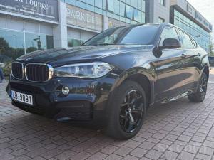 Black BMW X6 2017 in Riga, with an engine capacity of 3.00 L and mileage of 0 thousand km for 23500 €, photo 3 on AUTOMOTO.COM.LV