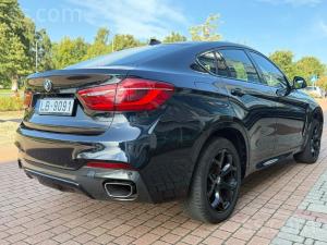 Black BMW X6 2017 in Riga, with an engine capacity of 3.00 L and mileage of 0 thousand km for 23500 €, photo 12 on AUTOMOTO.COM.LV